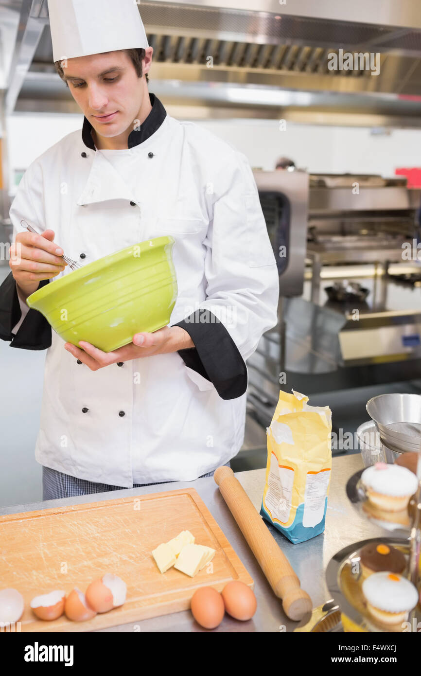 Male mixing cake hi-res stock photography and images - Alamy