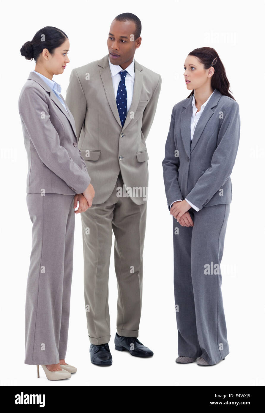 Two business people watching their co-worker Stock Photo - Alamy