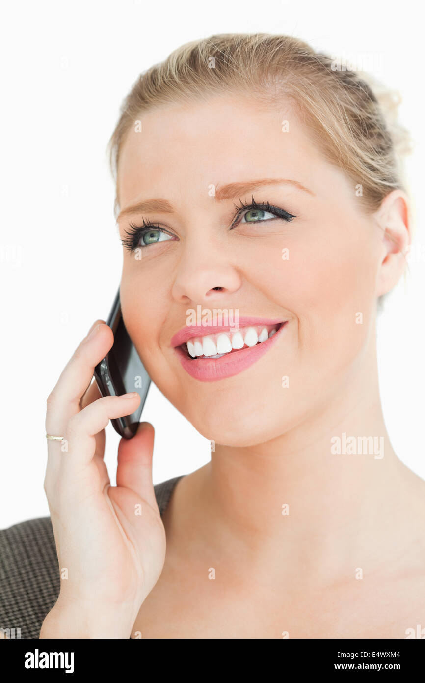 Pretty woman calling with her smartphone Stock Photo - Alamy