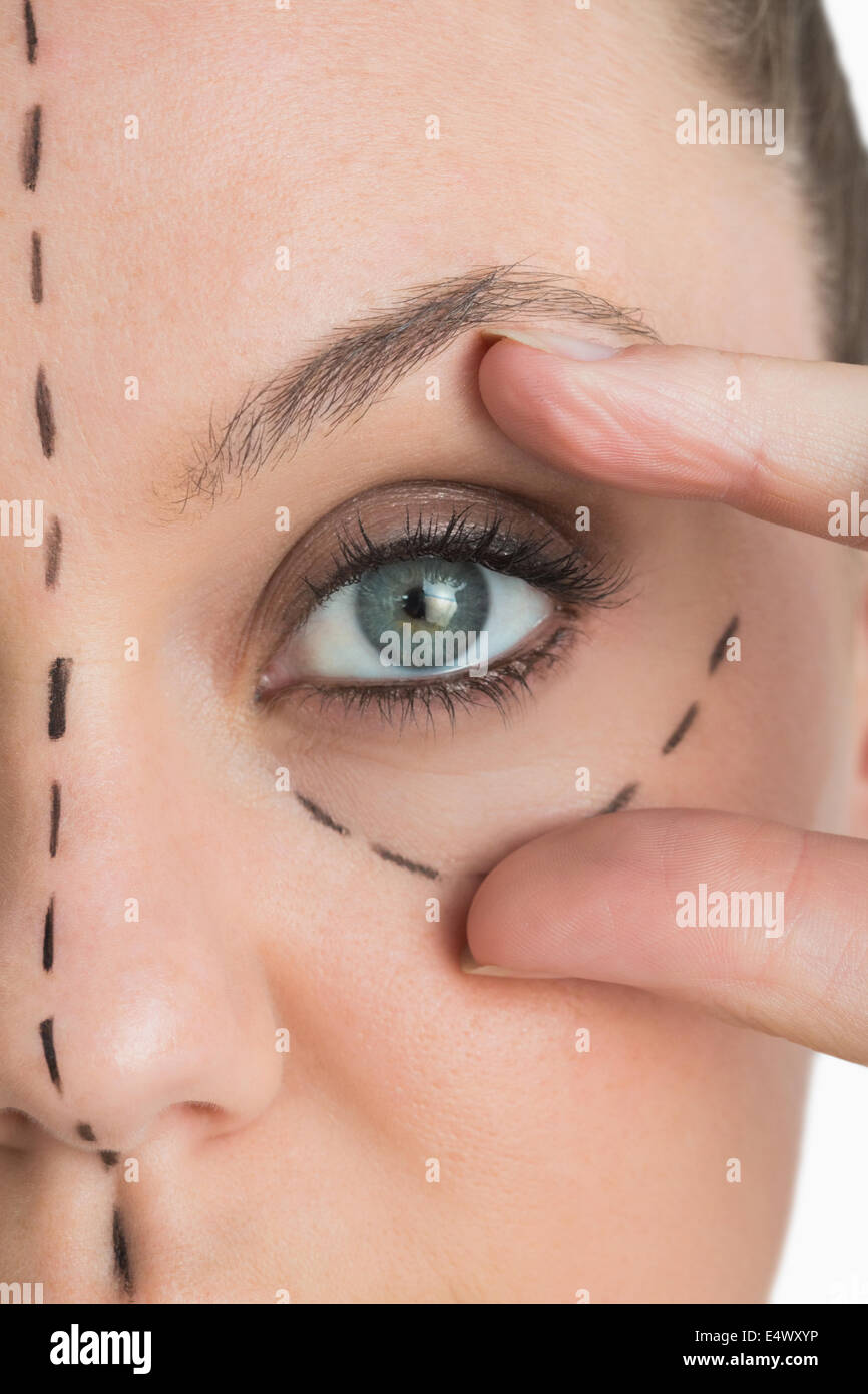 Woman stretching her eye out Stock Photo - Alamy