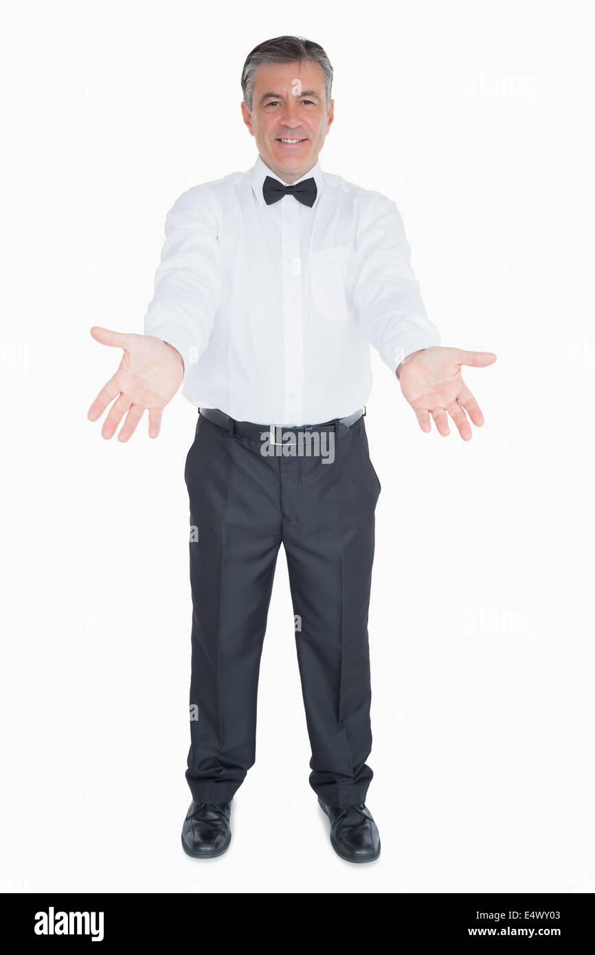 Man in a suit with open arms Stock Photo - Alamy