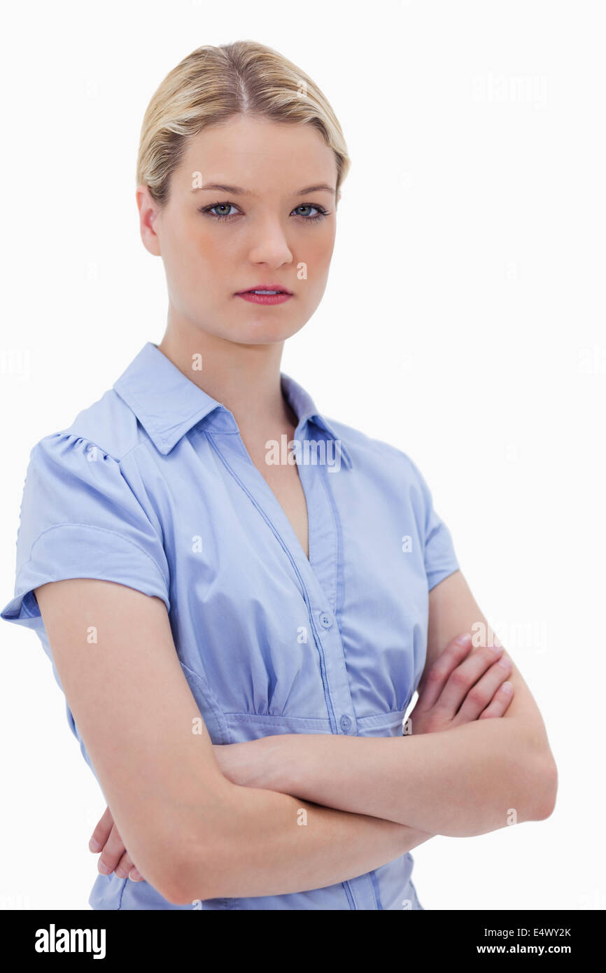 Woman standing with arms folded Stock Photo - Alamy