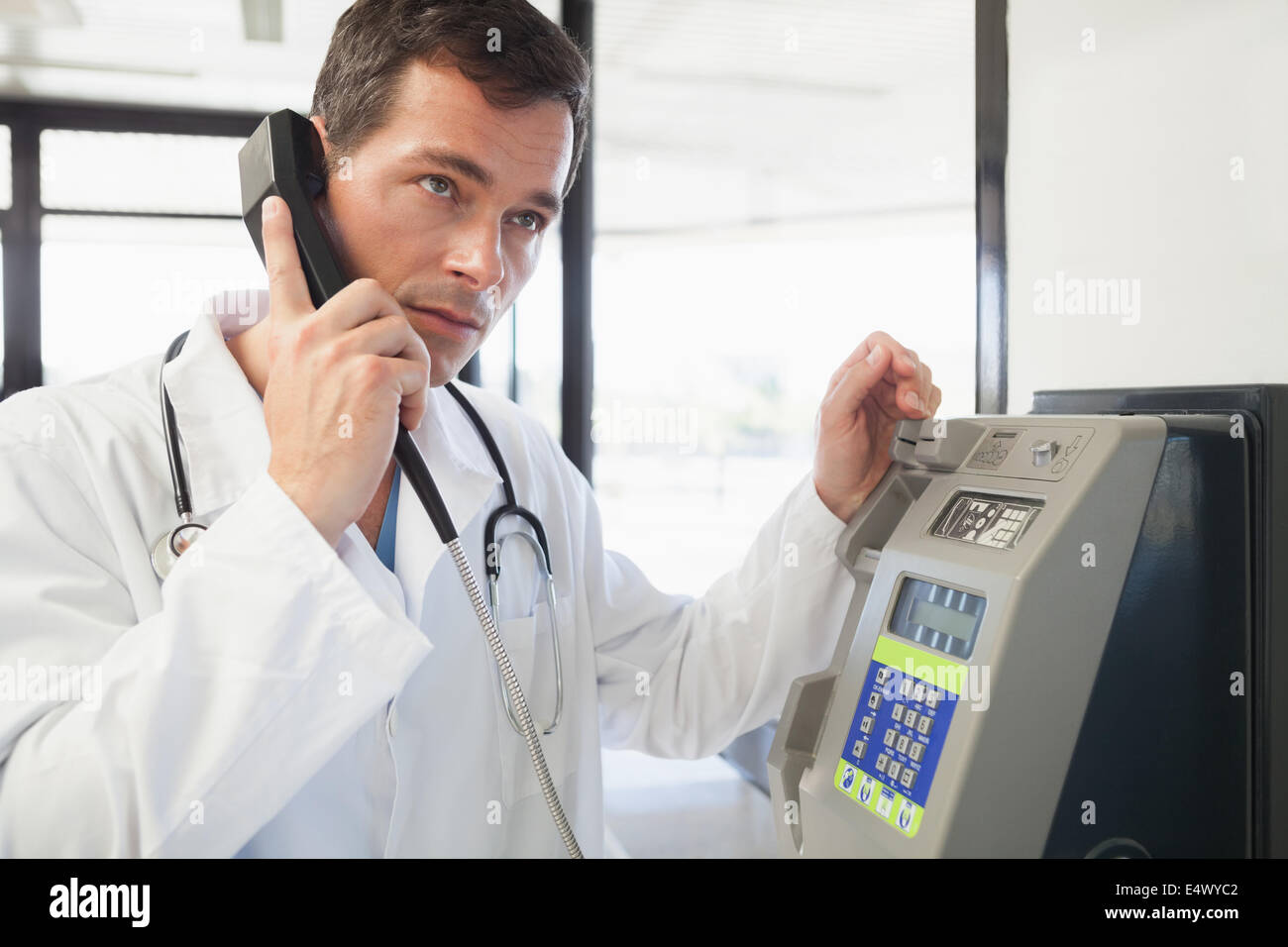 Doctor calling in the hospital Stock Photo - Alamy