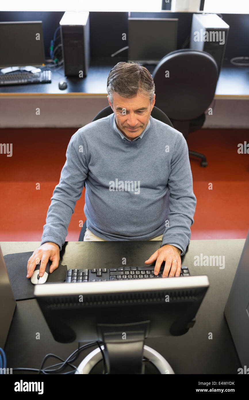 Mature student using computer Stock Photo - Alamy