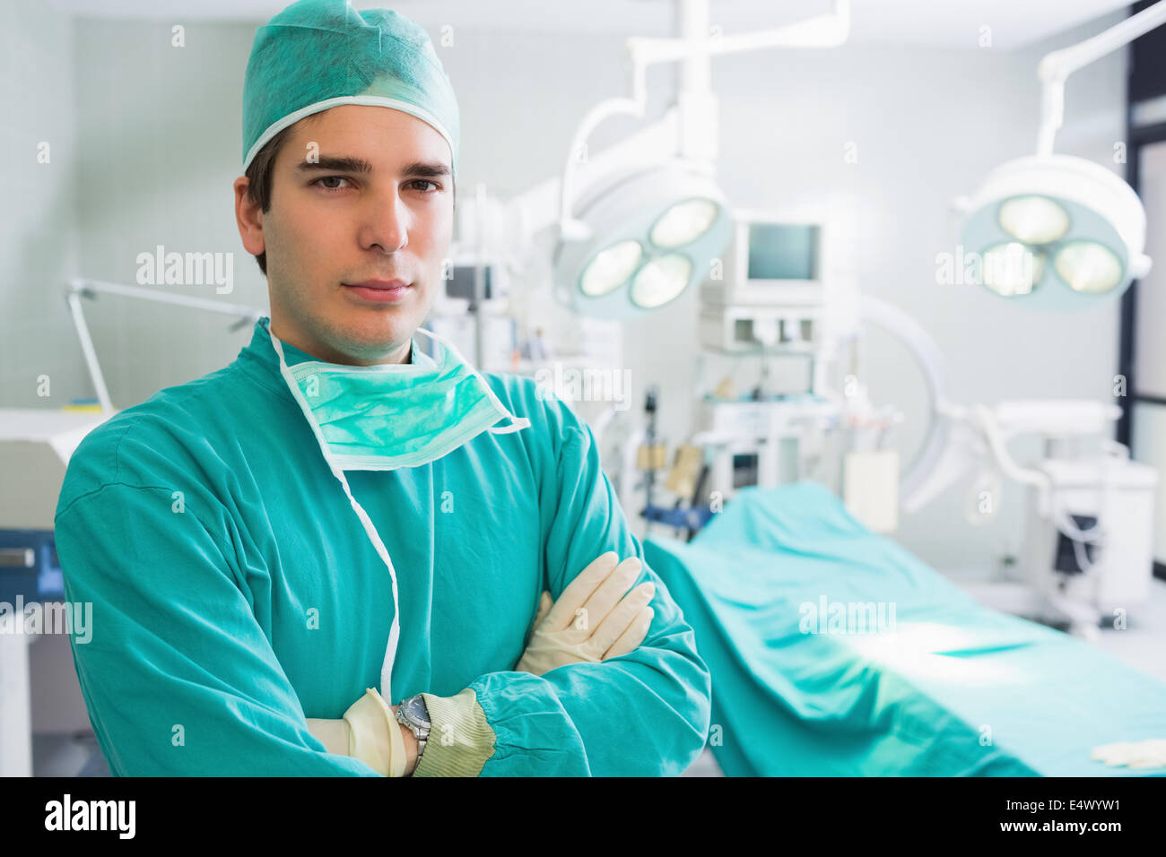 Surgeon with arms crossed Stock Photo - Alamy