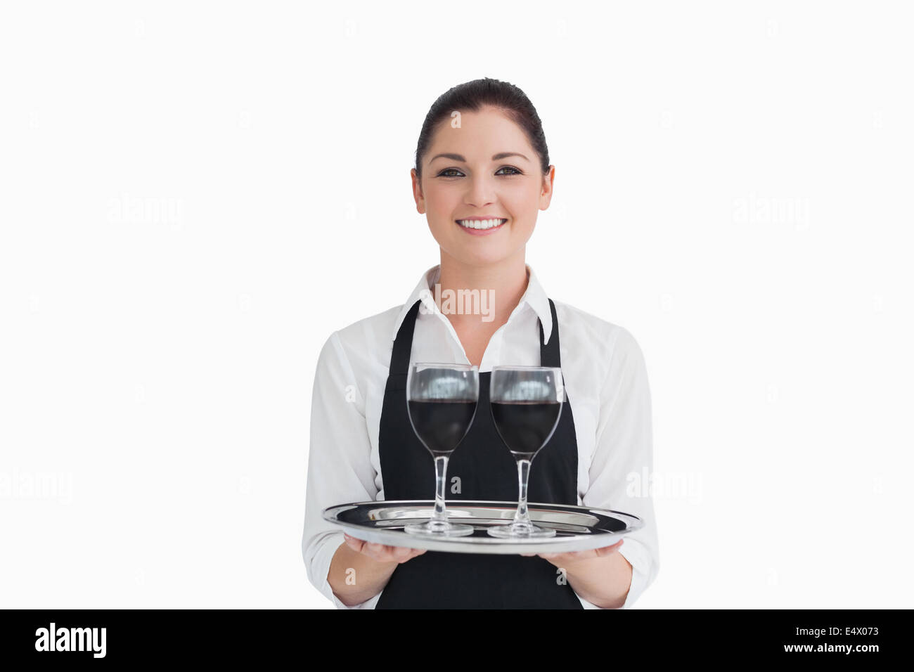 Waitress holding wine Stock Photo - Alamy
