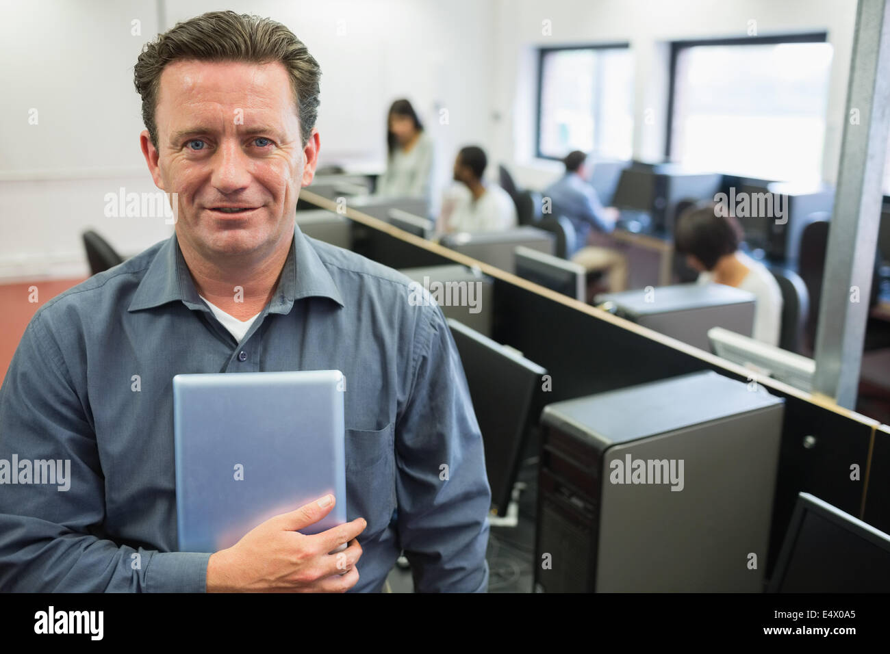 Woman holding tablet man typing hi-res stock photography and images - Alamy