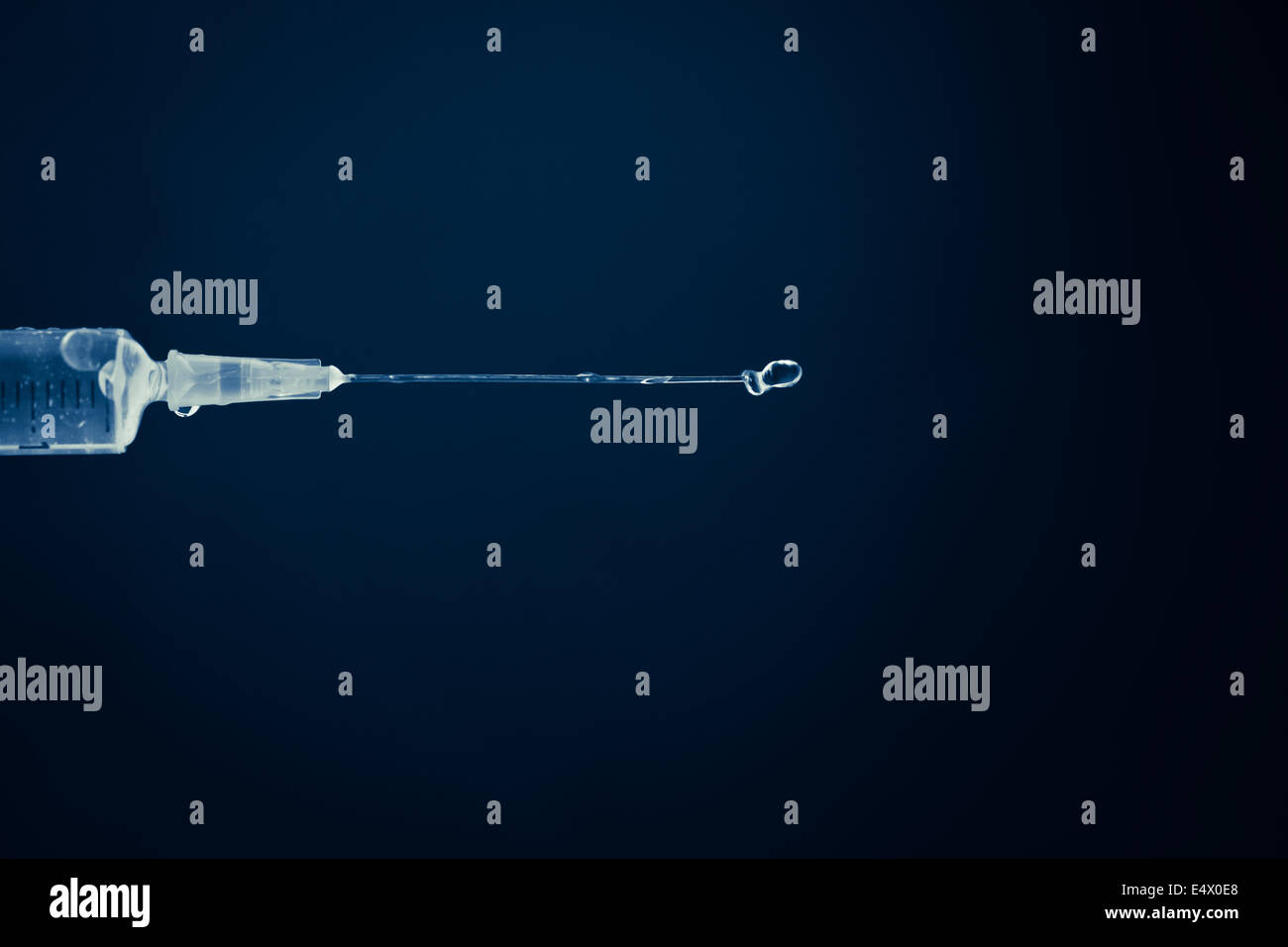 Drop outgoing of a syringe Stock Photo - Alamy