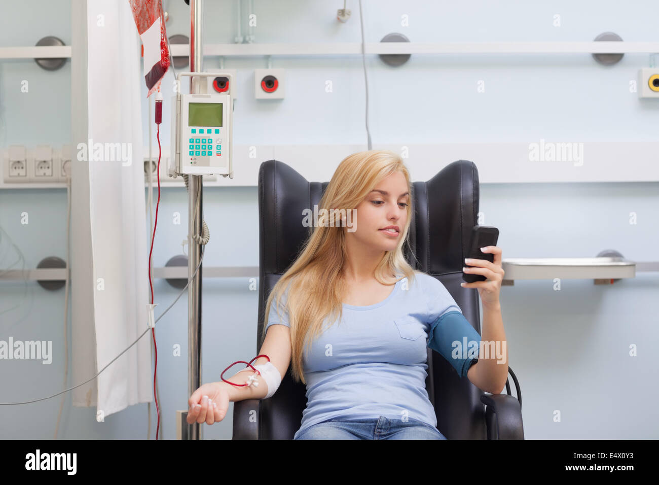 Woman receiving a blood transfusion Stock Photo - Alamy