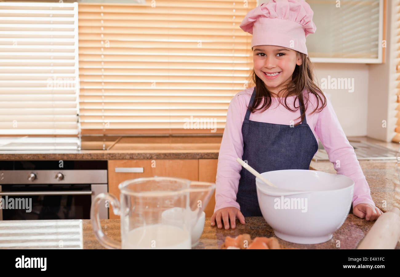 Little girl baking Stock Photo - Alamy