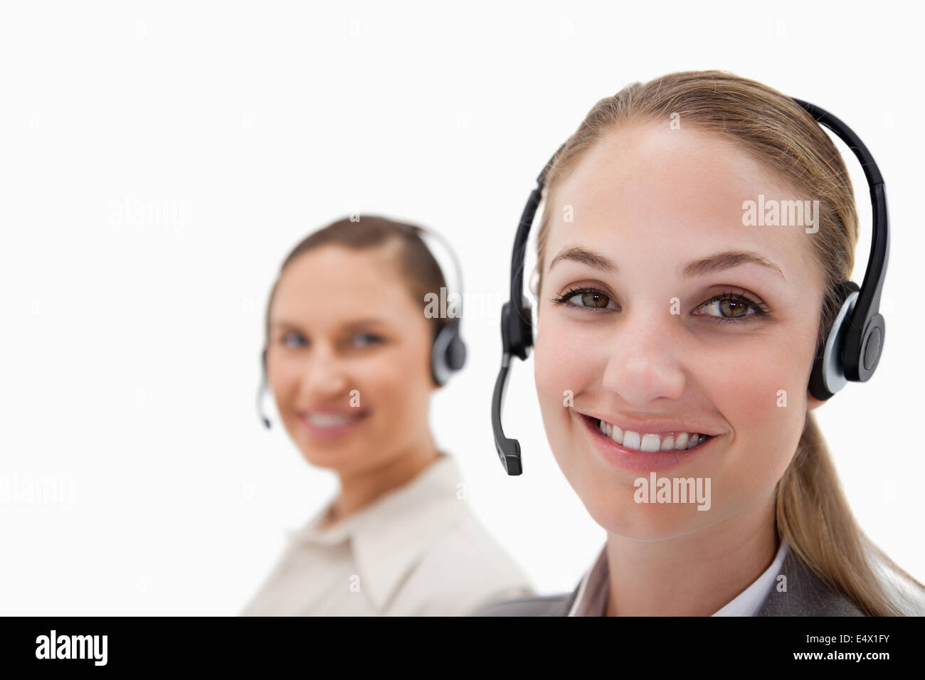 Young operators using headsets Stock Photo - Alamy