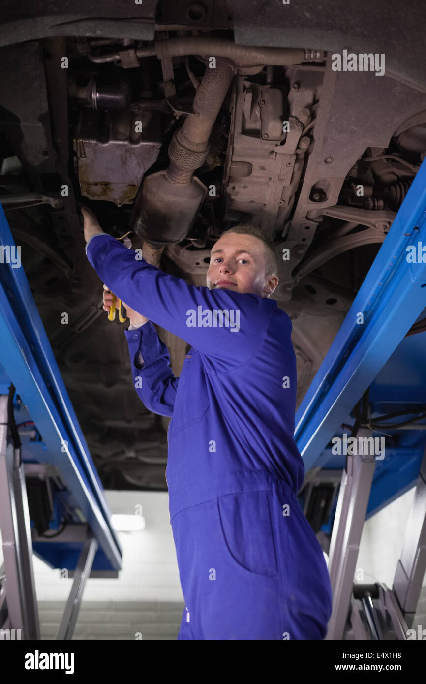 Man repairing a car hi-res stock photography and images - Alamy