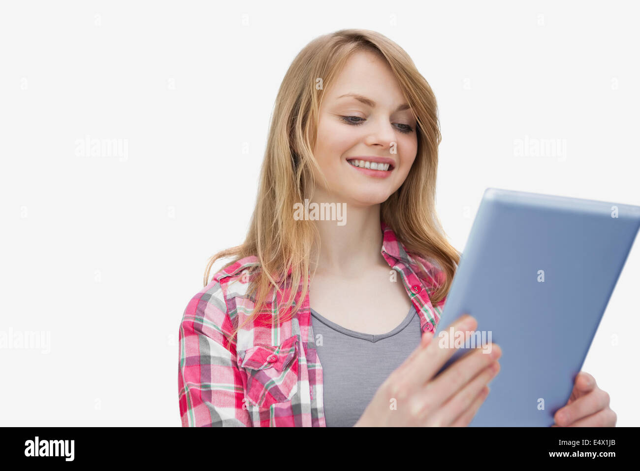 Woman looking at a tablet computer Stock Photo - Alamy