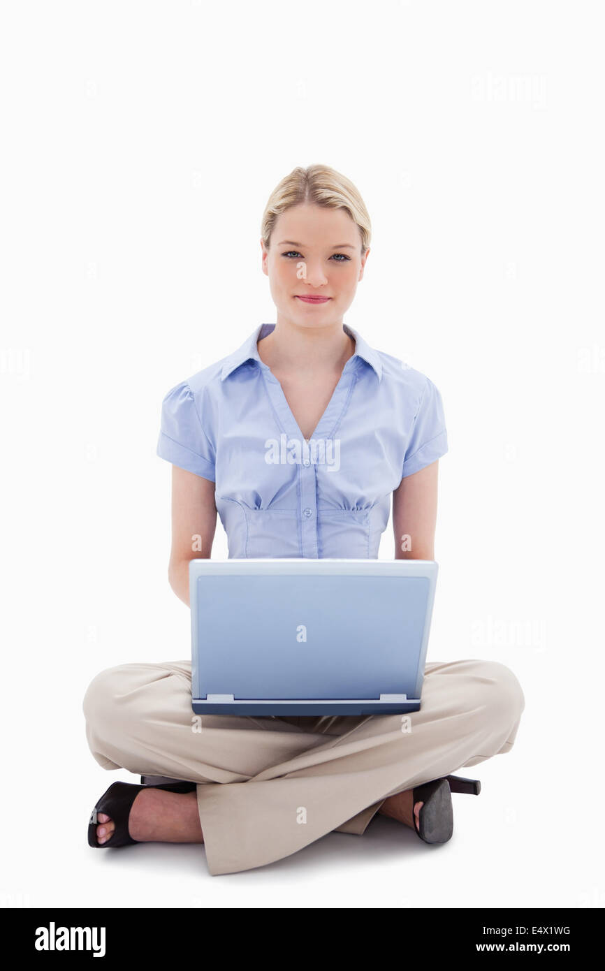 Woman sitting with her laptop Stock Photo - Alamy