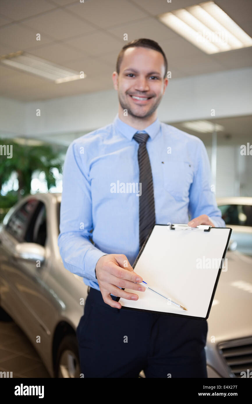 Man holding a contract Stock Photo - Alamy