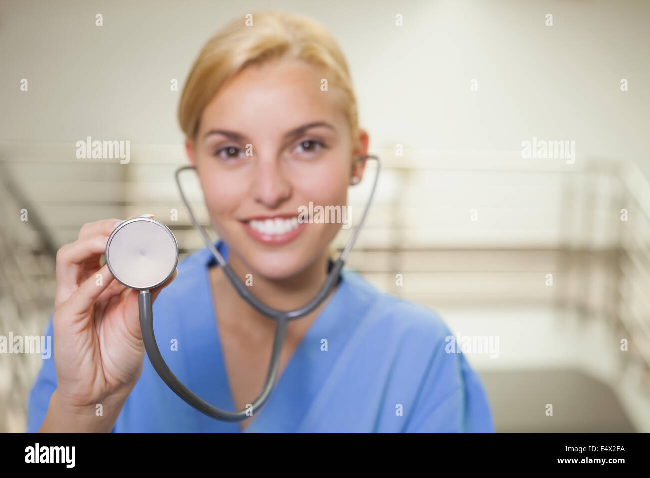 Nurse holding a stethoscope Stock Photo - Alamy