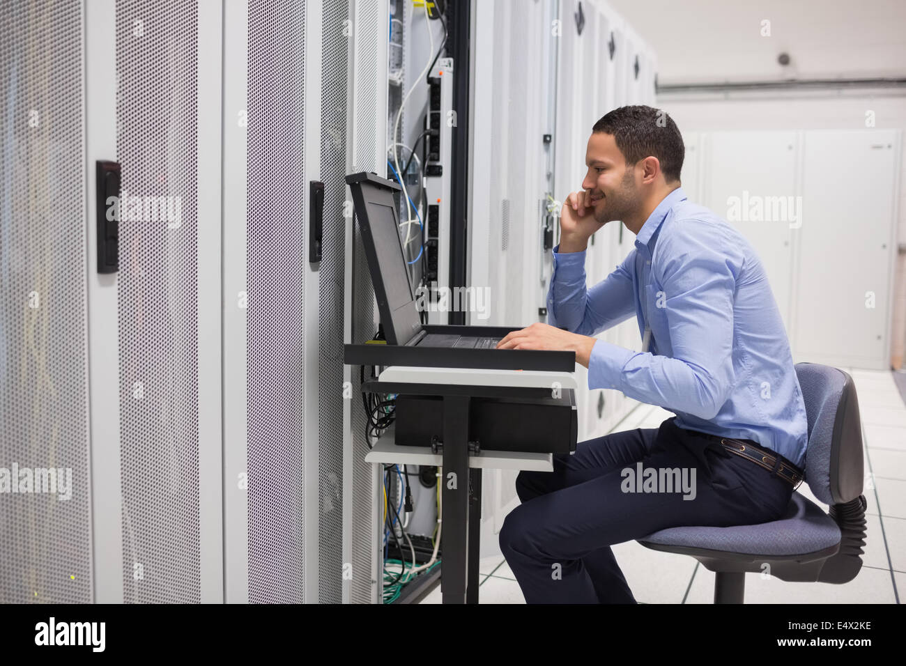 Man maintaining the servers Stock Photo - Alamy