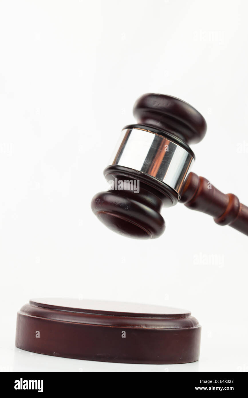 Hammer banging gavel Stock Photo - Alamy