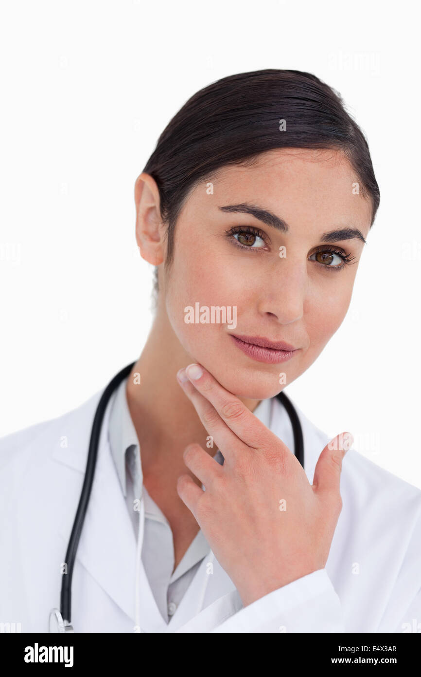 Pensive female doctor in white hi-res stock photography and images - Alamy