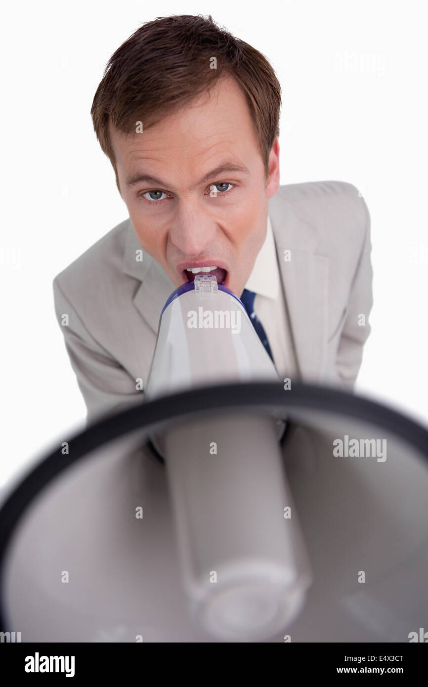 Businessman yelling through megaphone Stock Photo - Alamy