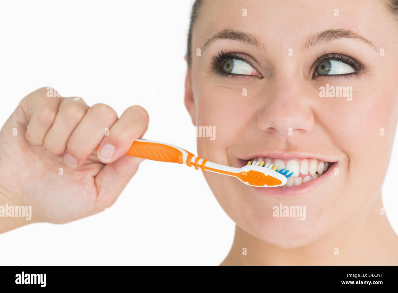 Cute woman washing her teeth Stock Photo - Alamy