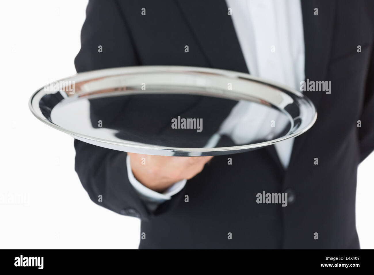 Waiter with silver tray Stock Photo - Alamy