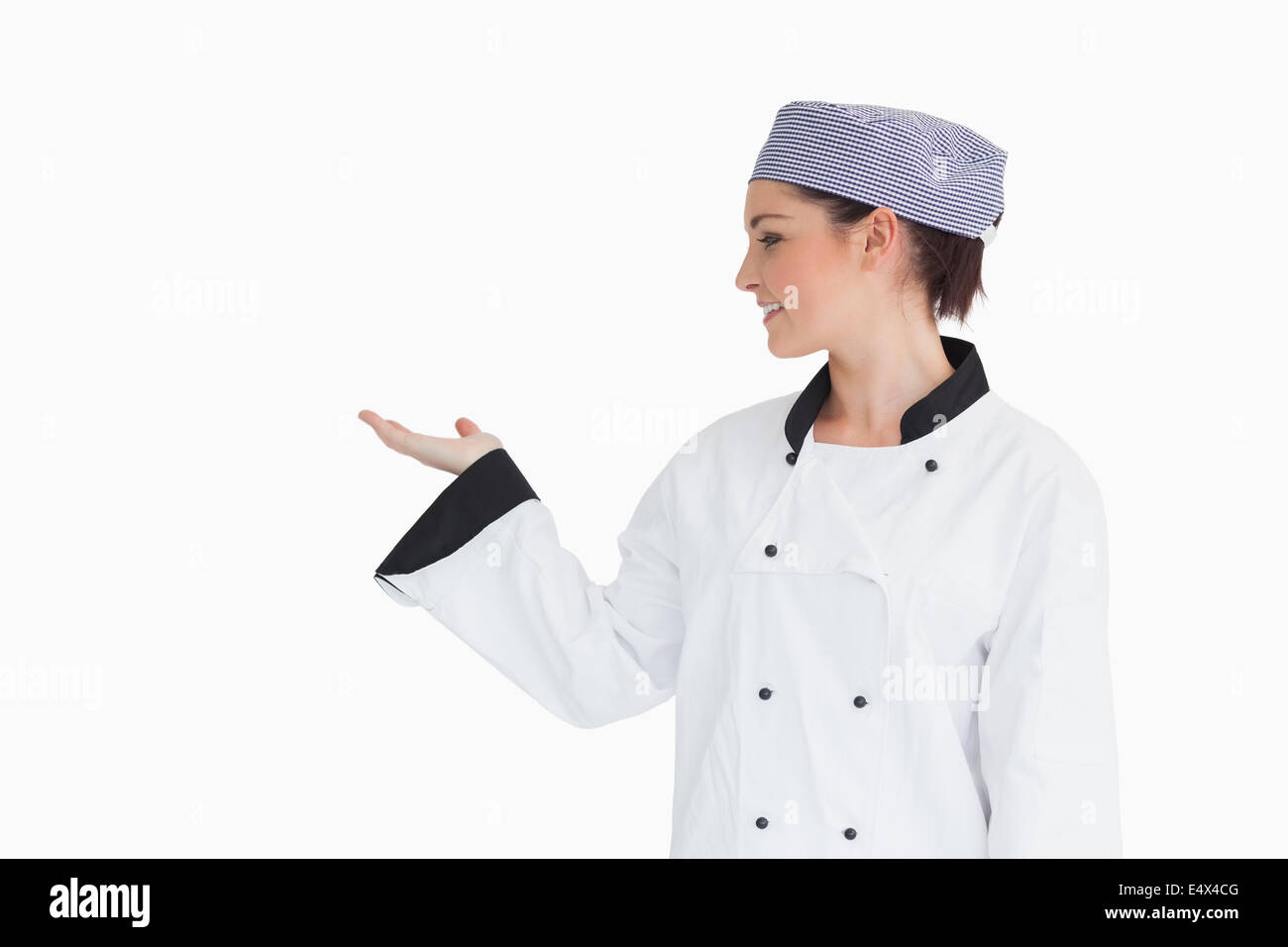 Hand female chef holding Cut Out Stock Images & Pictures - Alamy
