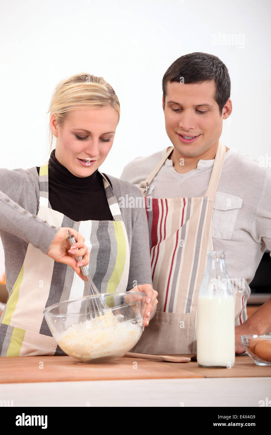 A couple baking Stock Photo - Alamy