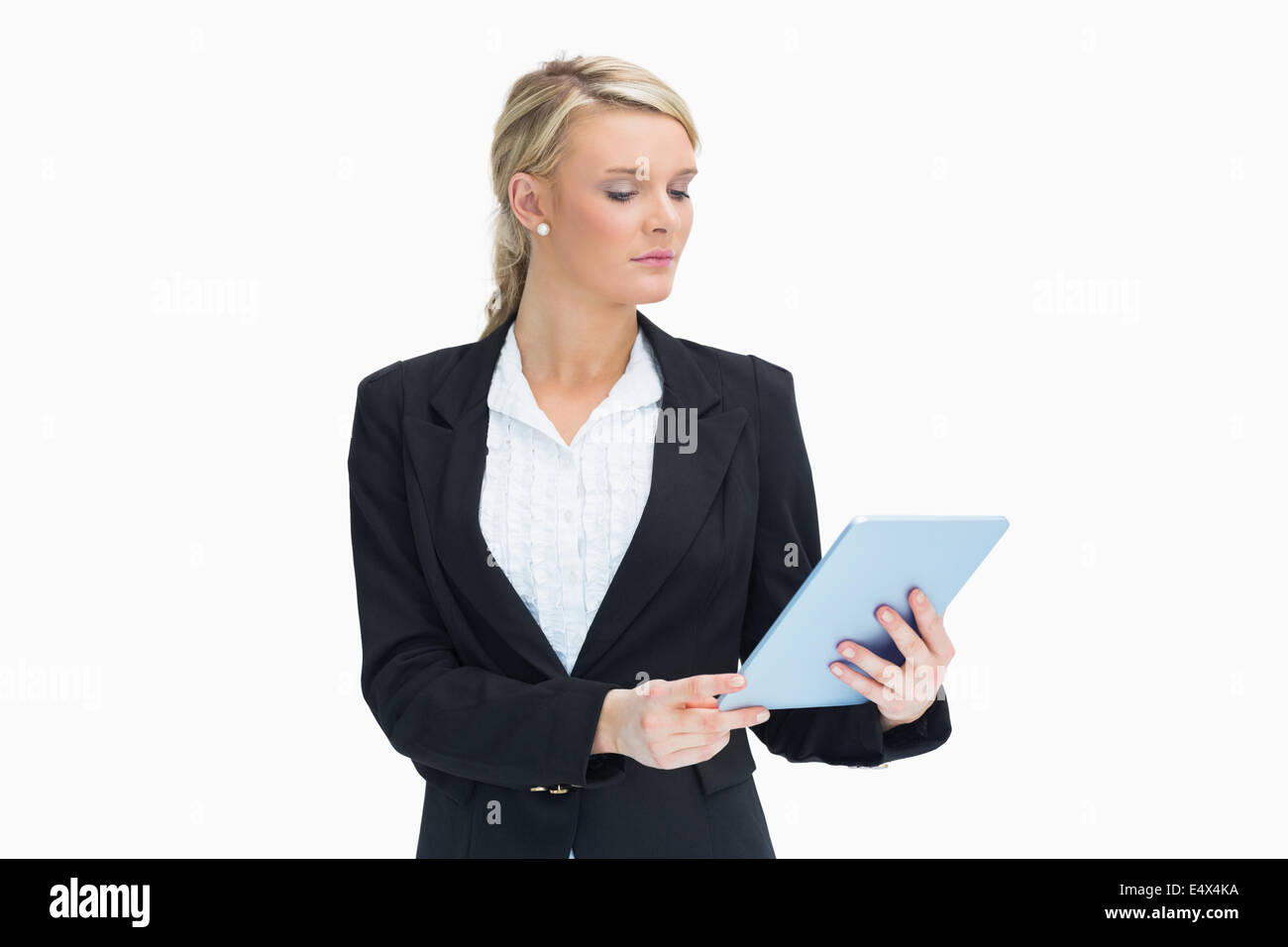 Blonde looking at her tablet Stock Photo - Alamy