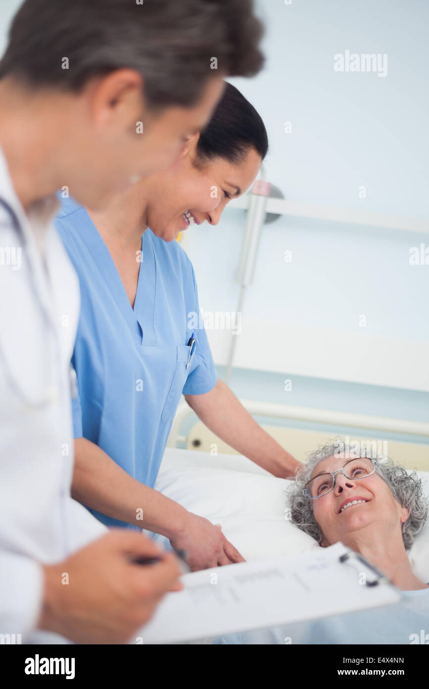 Male patient laughing female doctor hi-res stock photography and images ...