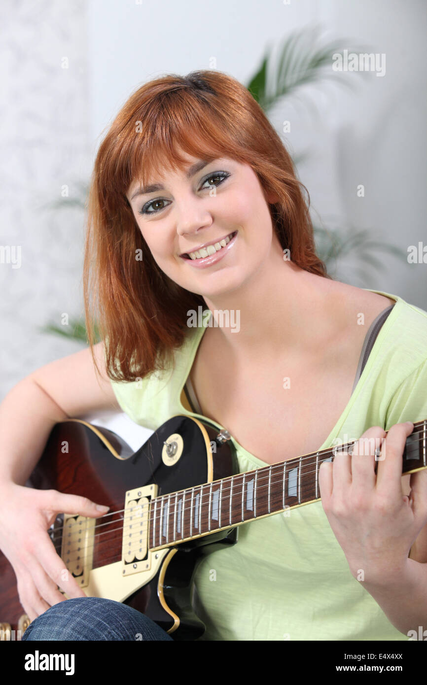 Woman with Guitar Stock Photo - Alamy