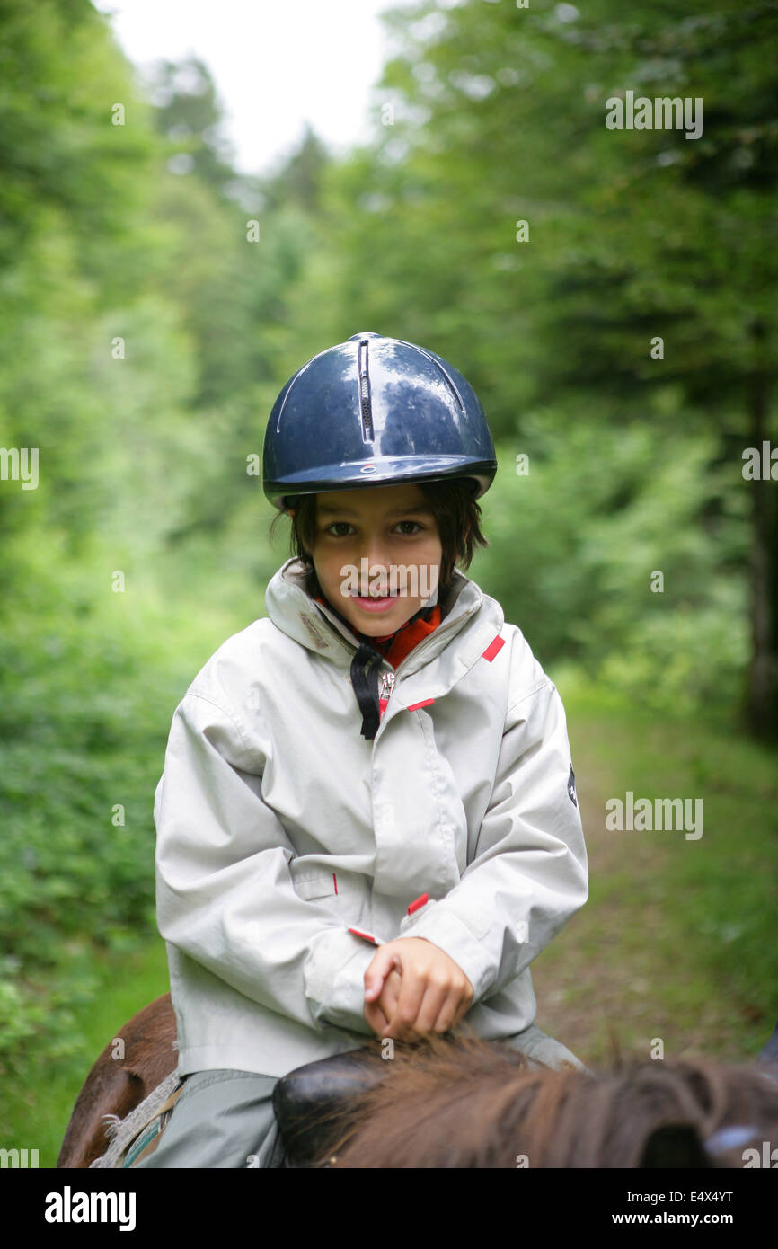 Boy child horse riding hi-res stock photography and images - Alamy