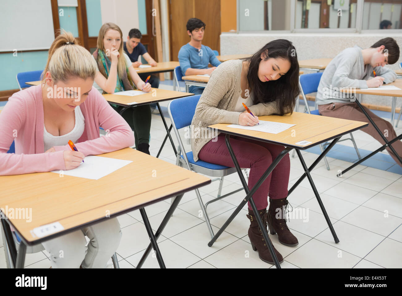 People sitting at the classroom Stock Photo - Alamy