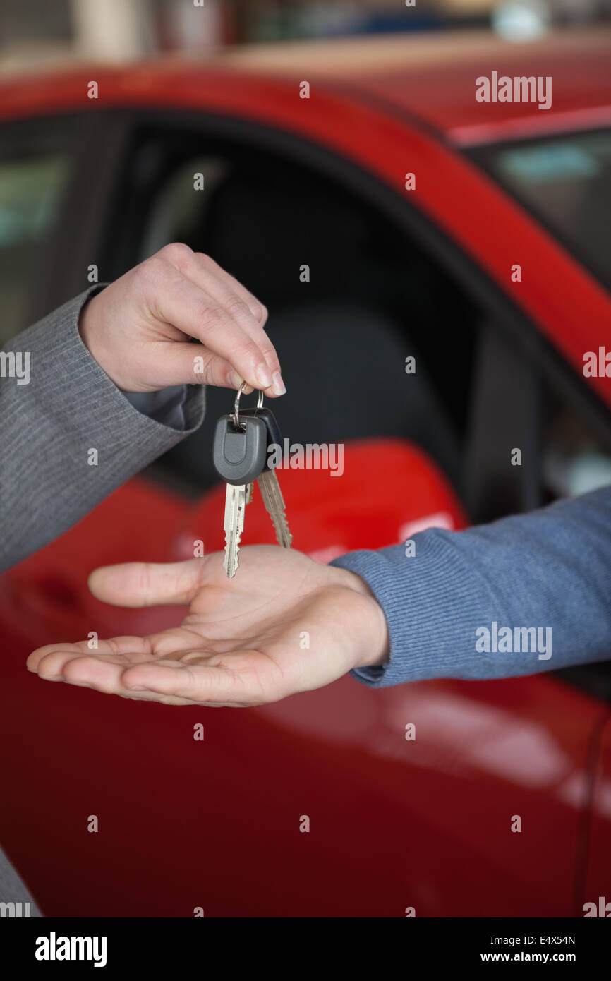 Keys given to someone Stock Photo - Alamy