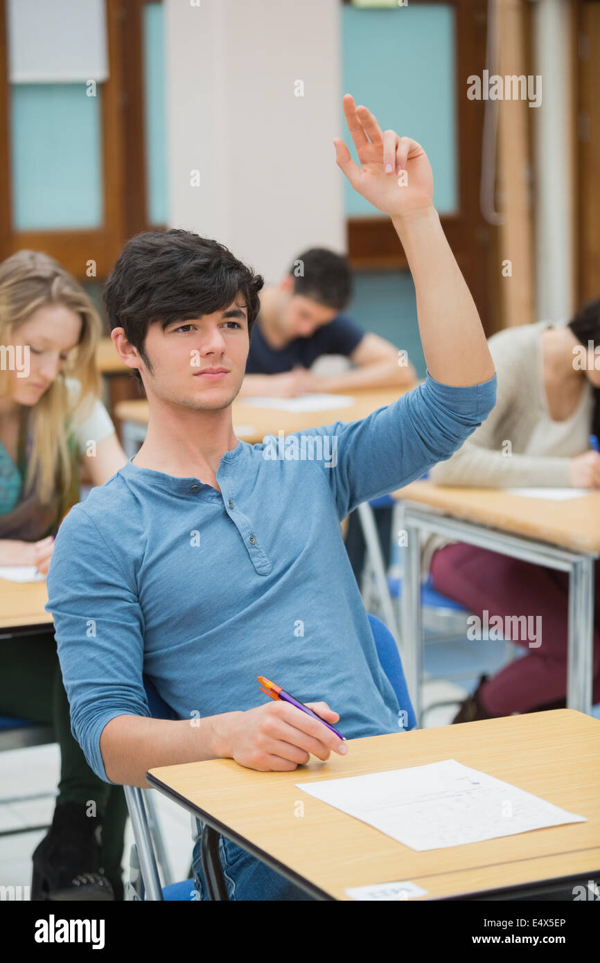 Female university student raising hand hi-res stock photography and ...