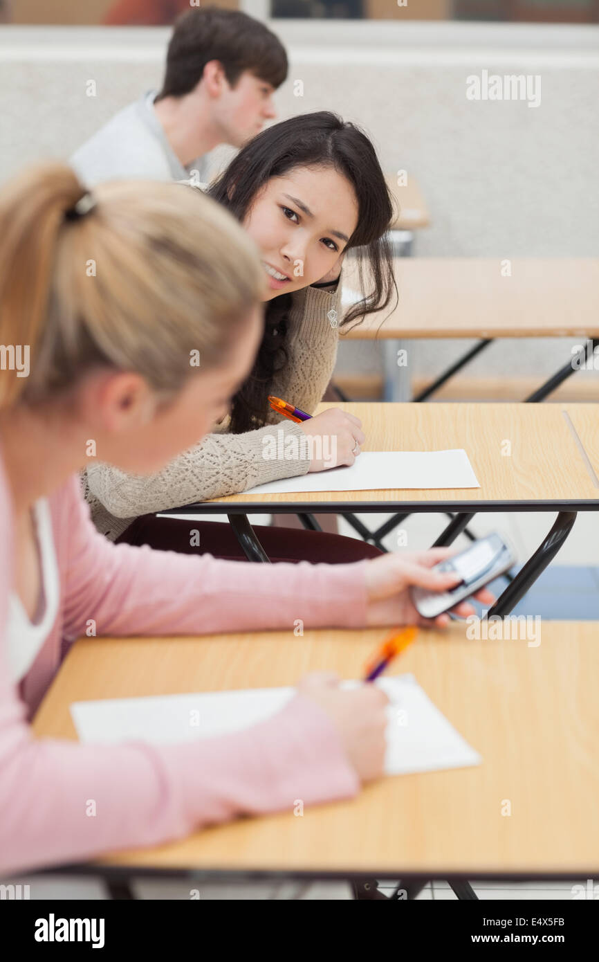 Students talking during class hi-res stock photography and images - Alamy