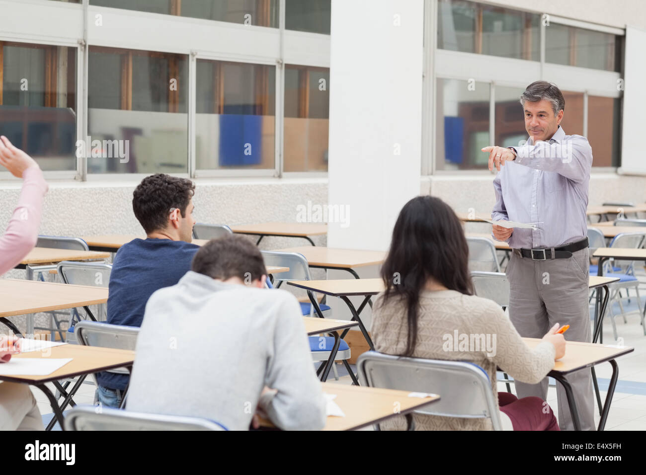 Female teacher asking student hi-res stock photography and images - Alamy