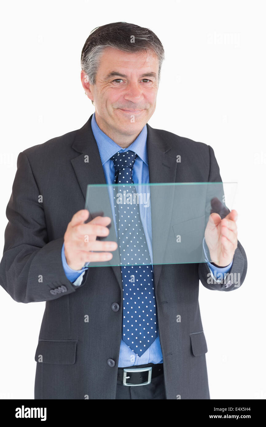 Cheerful man holding a pane Stock Photo - Alamy
