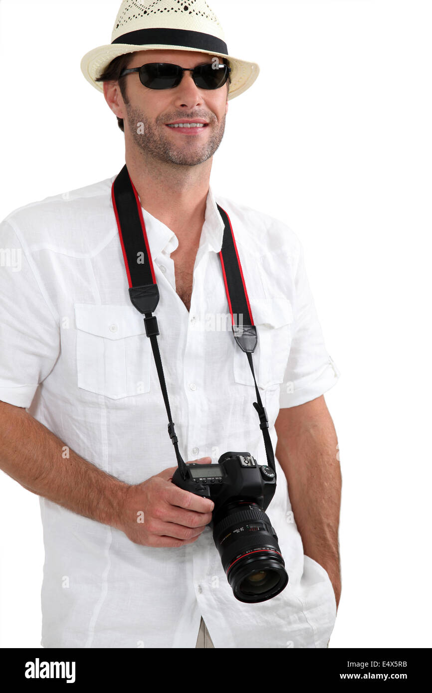 Portrait of man with camera Stock Photo - Alamy