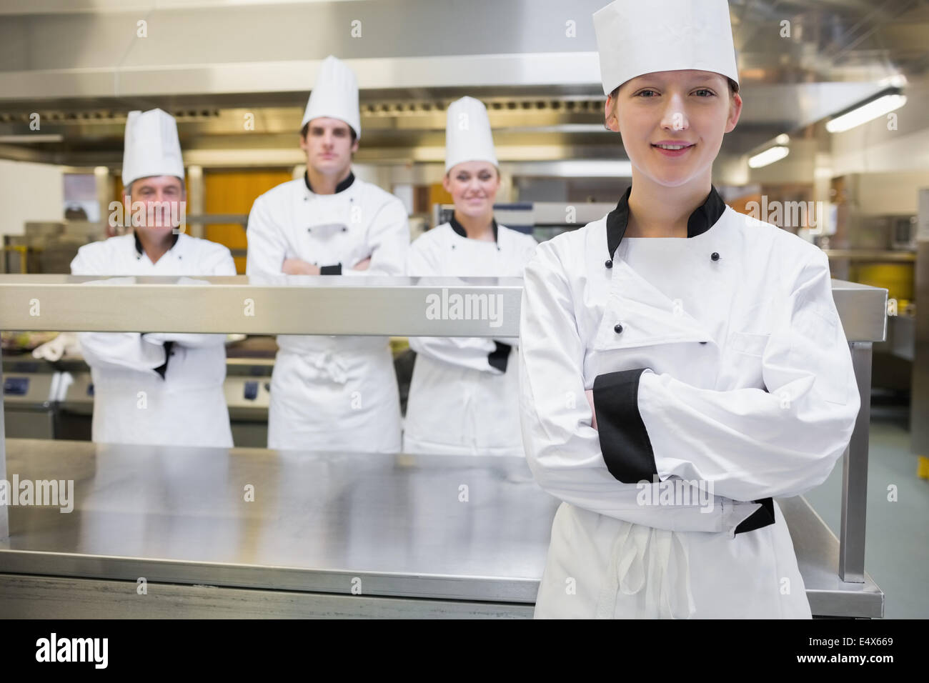 Female chef standing counter hi-res stock photography and images - Alamy