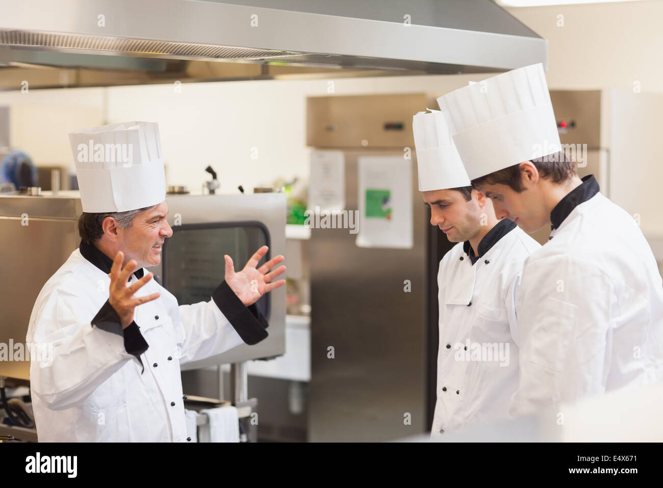 Upset scolding employees kitchen hi-res stock photography and images ...