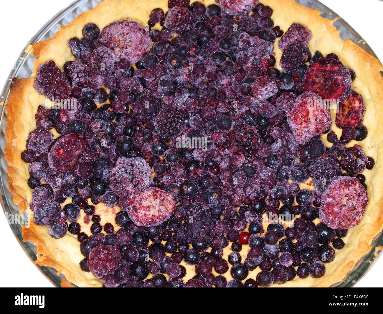 Round pie with frozen berries Stock Photo - Alamy