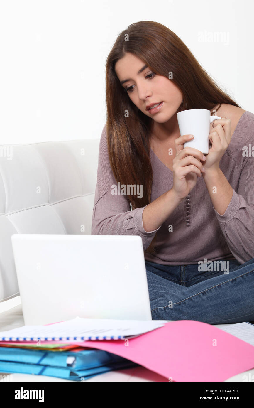 Young woman checking her emails Stock Photo - Alamy