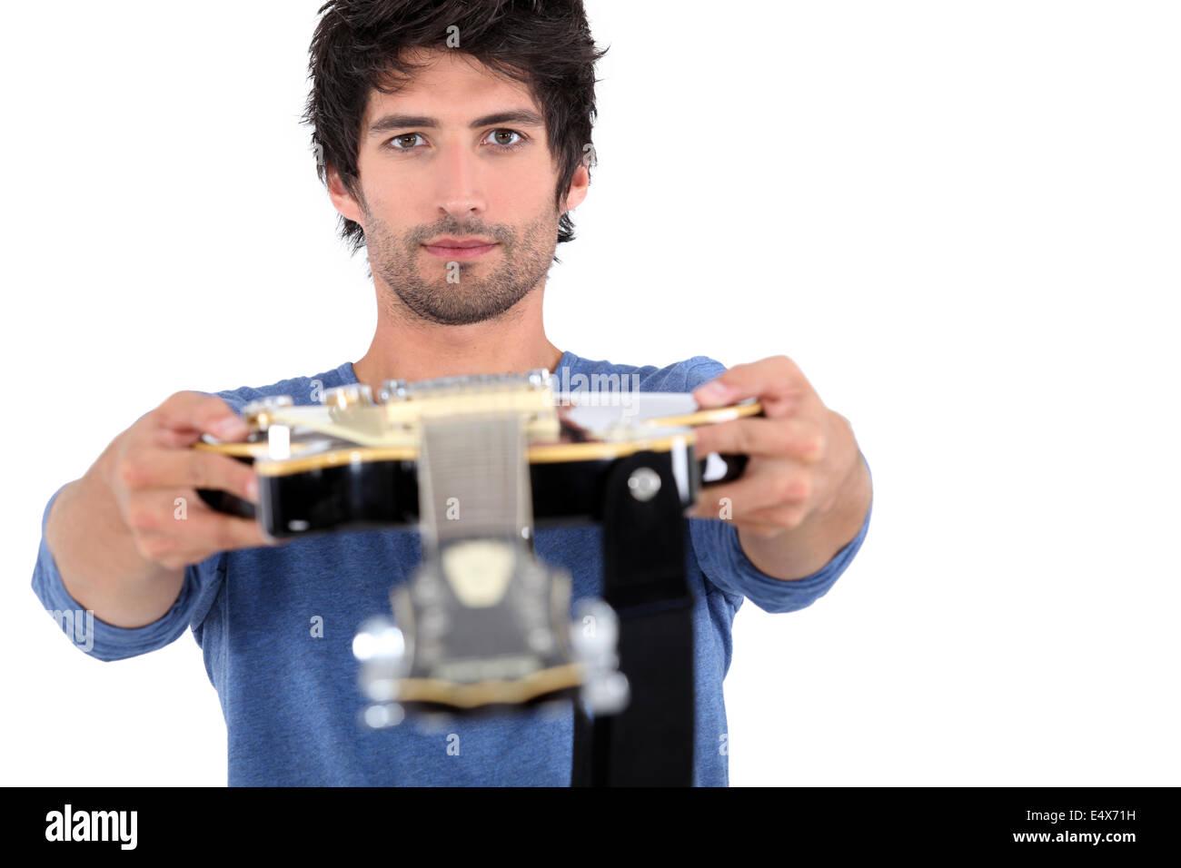 man holding guitar Stock Photo - Alamy