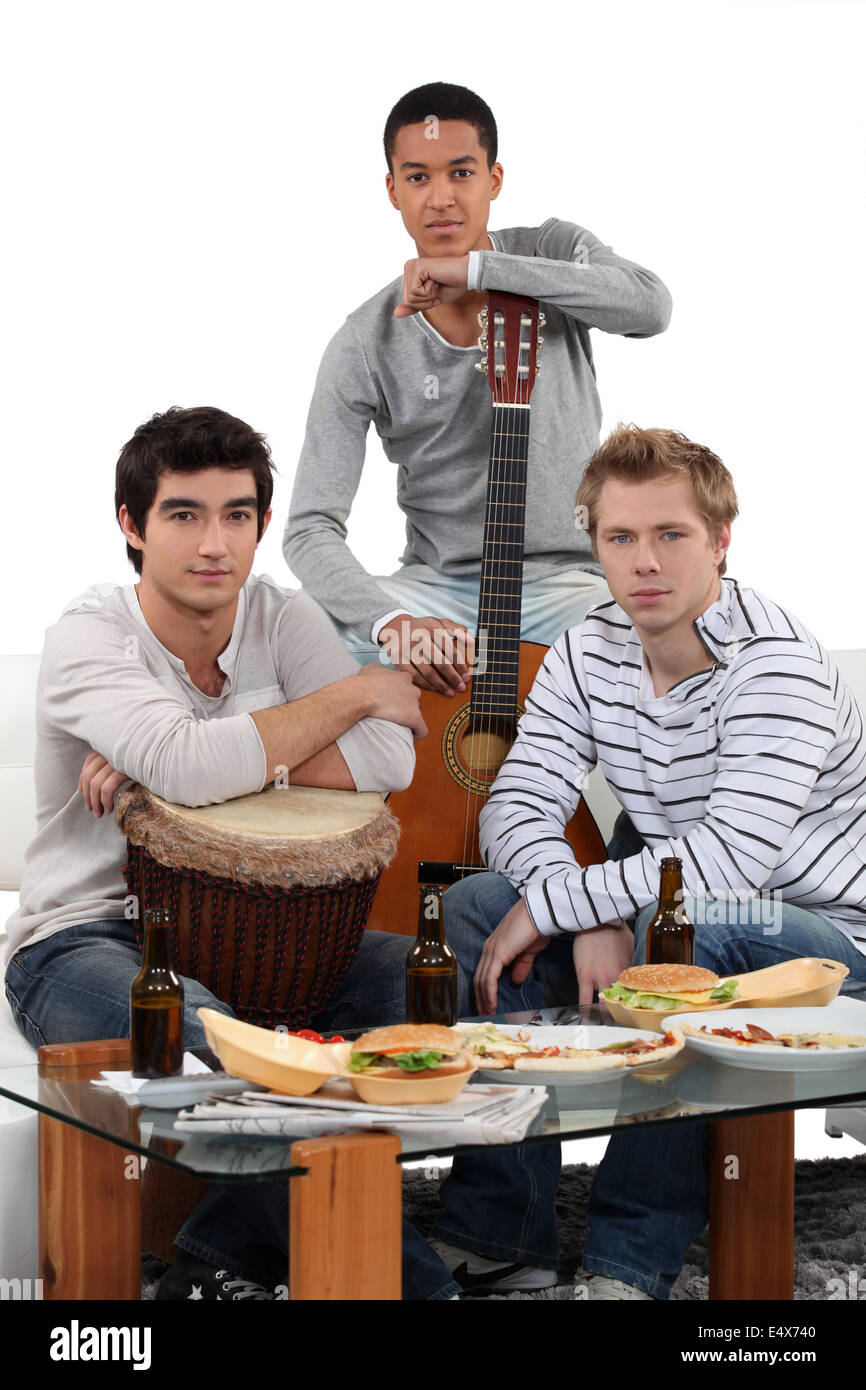 Young men with musical instruments Stock Photo - Alamy