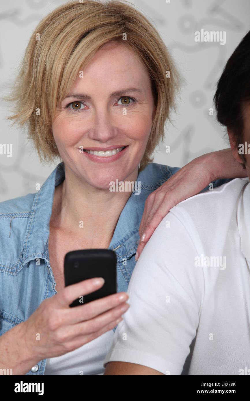 Woman off phone hi-res stock photography and images - Alamy