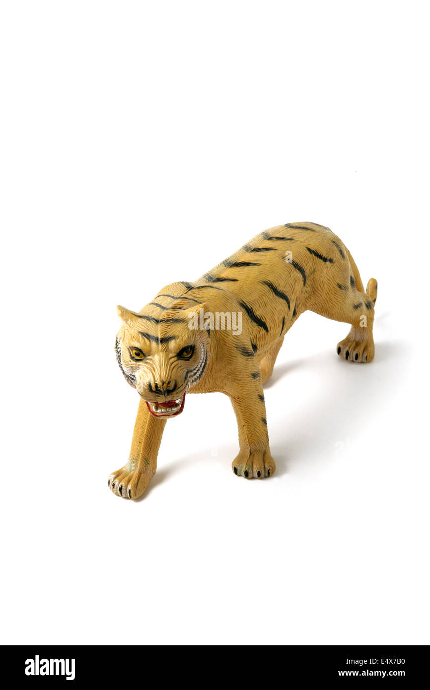Plastic toy tiger Stock Photo - Alamy