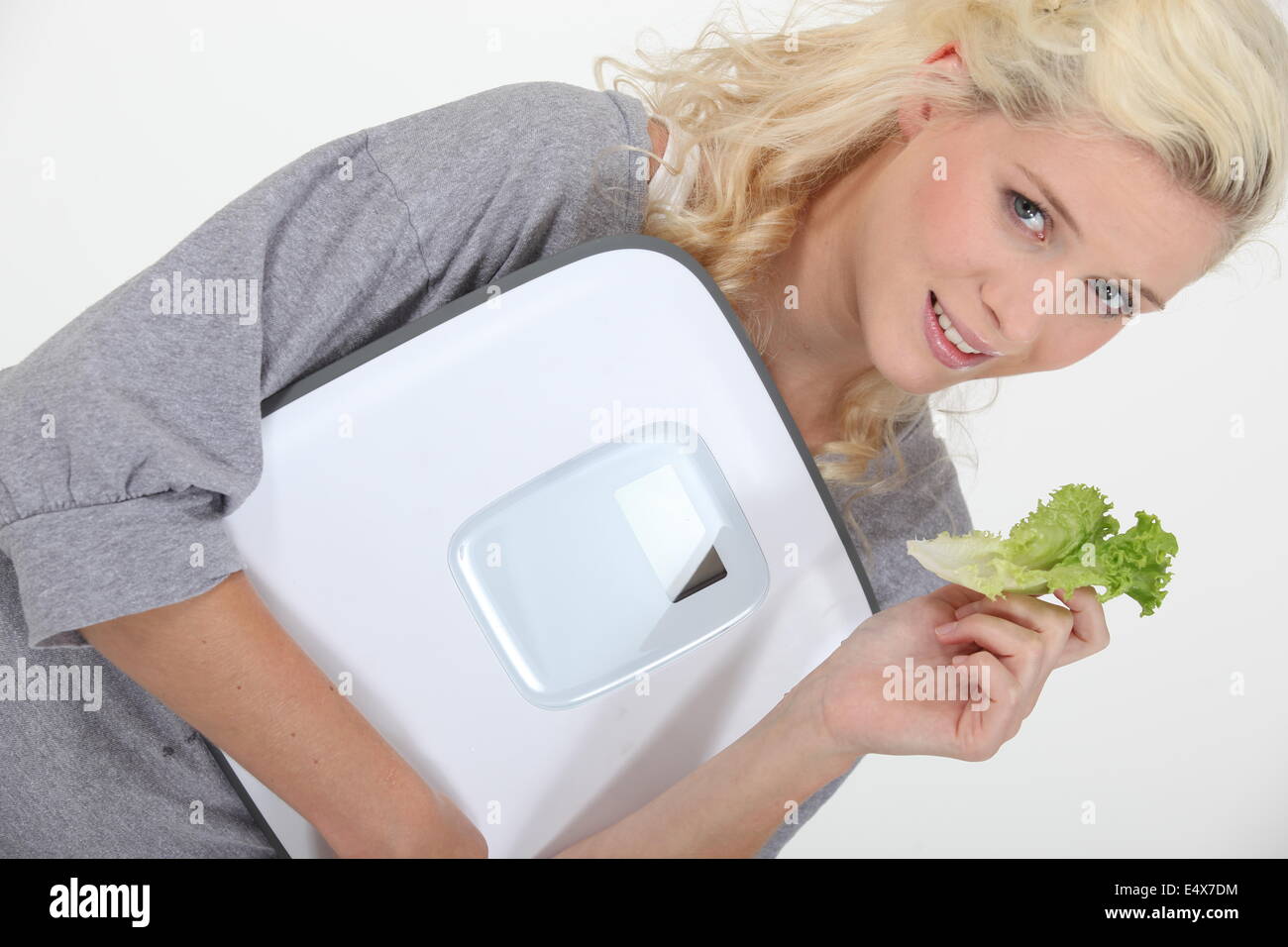 Slim woman scale in hi-res stock photography and images - Alamy