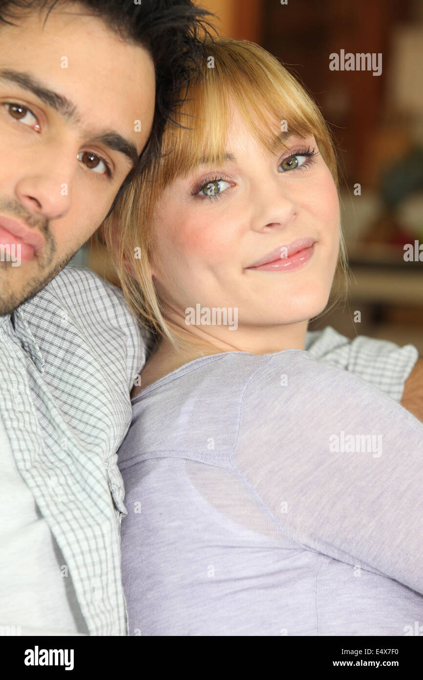 Couple embraced together hi-res stock photography and images - Alamy