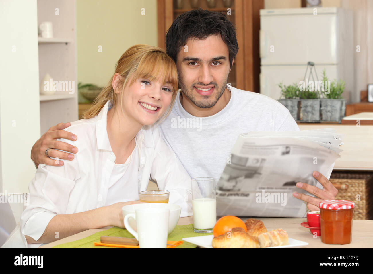 Couple eating breakfast together Stock Photo - Alamy